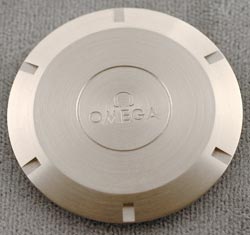 Omega Case Backs and Enlargement Rings