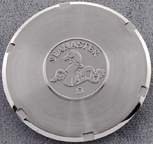 Omega Case Backs and Enlargement Rings